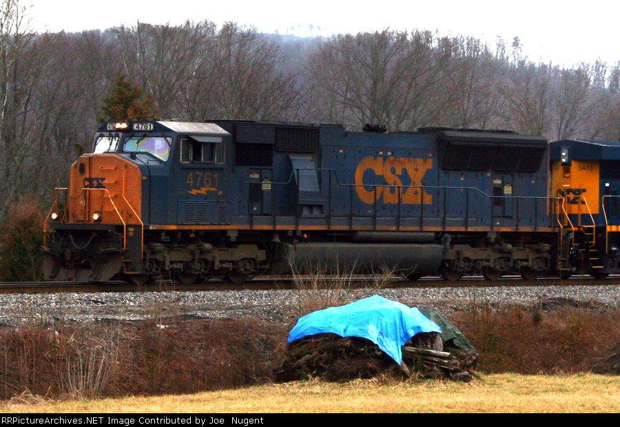 CSX 4761 creeps down the siding waiting for a southbound to clear the main